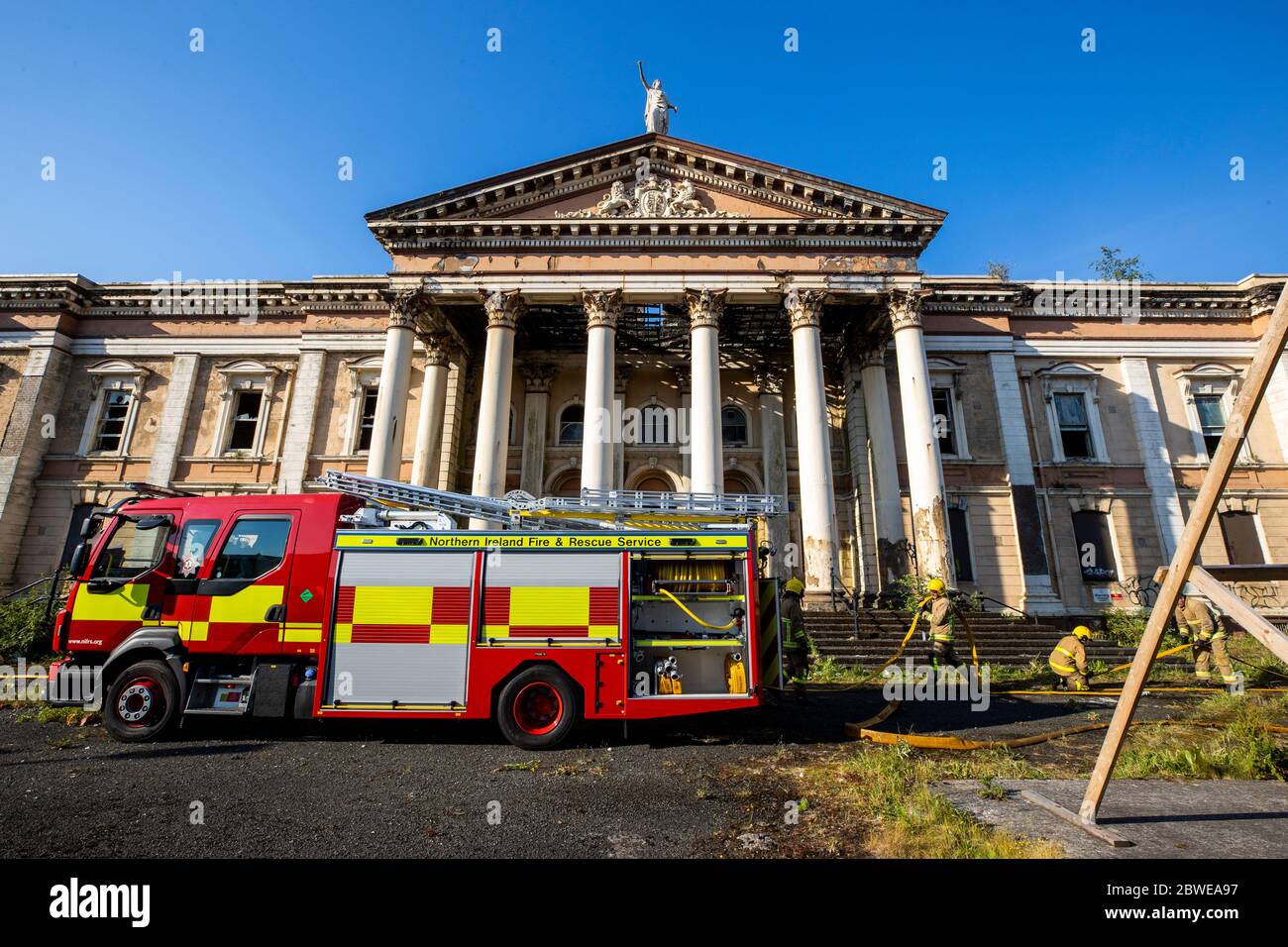 Northern Ireland Fire and Rescue Service firefighters tackling a large ...