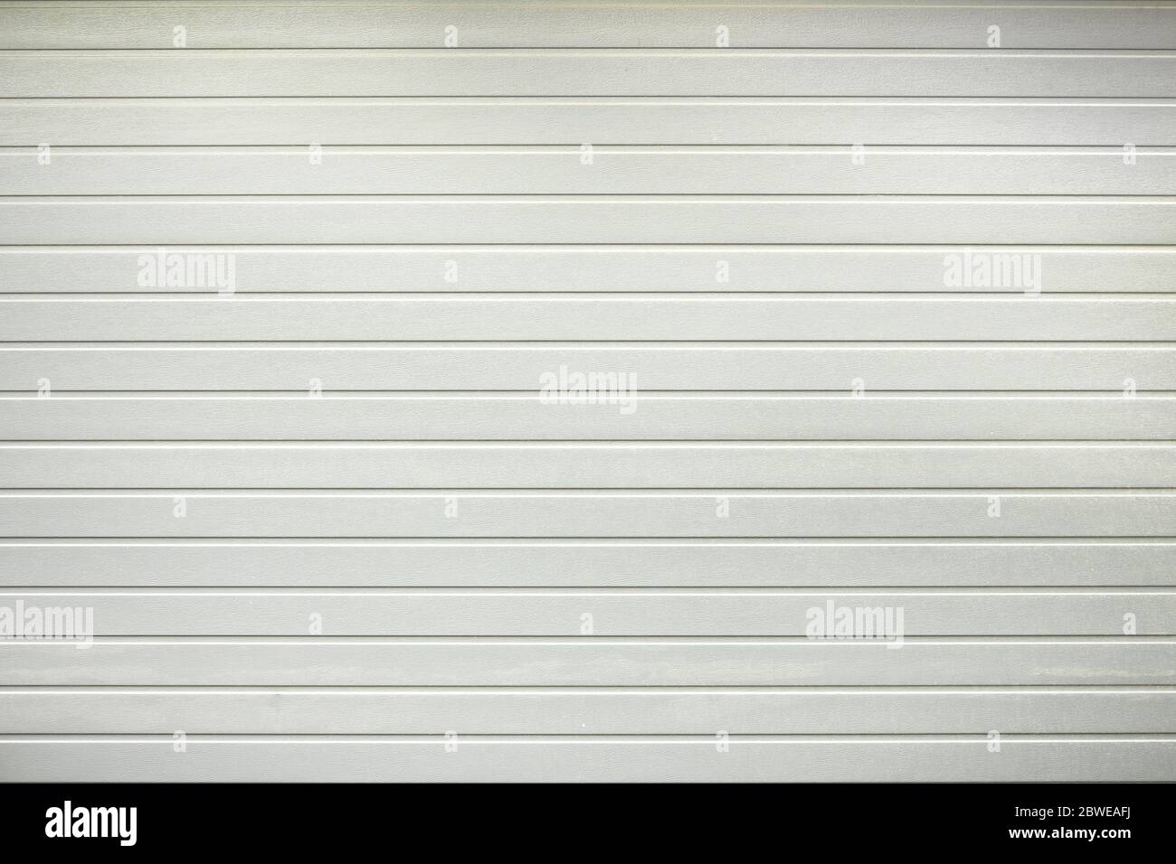 White garage door texture. Perforated metal garage door. High ...