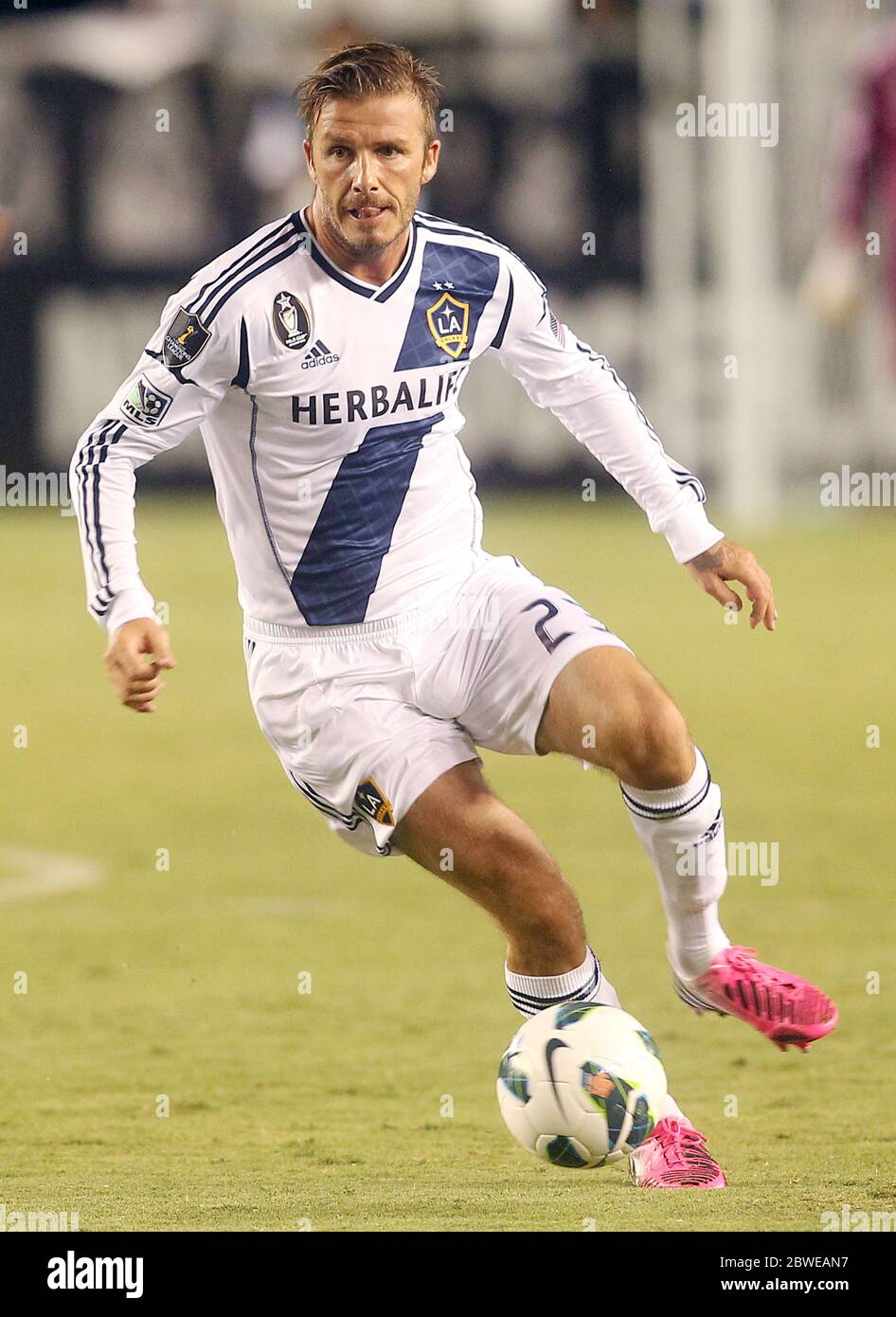 David Beckham kicking football during game, February 2011 Stock Photo ...