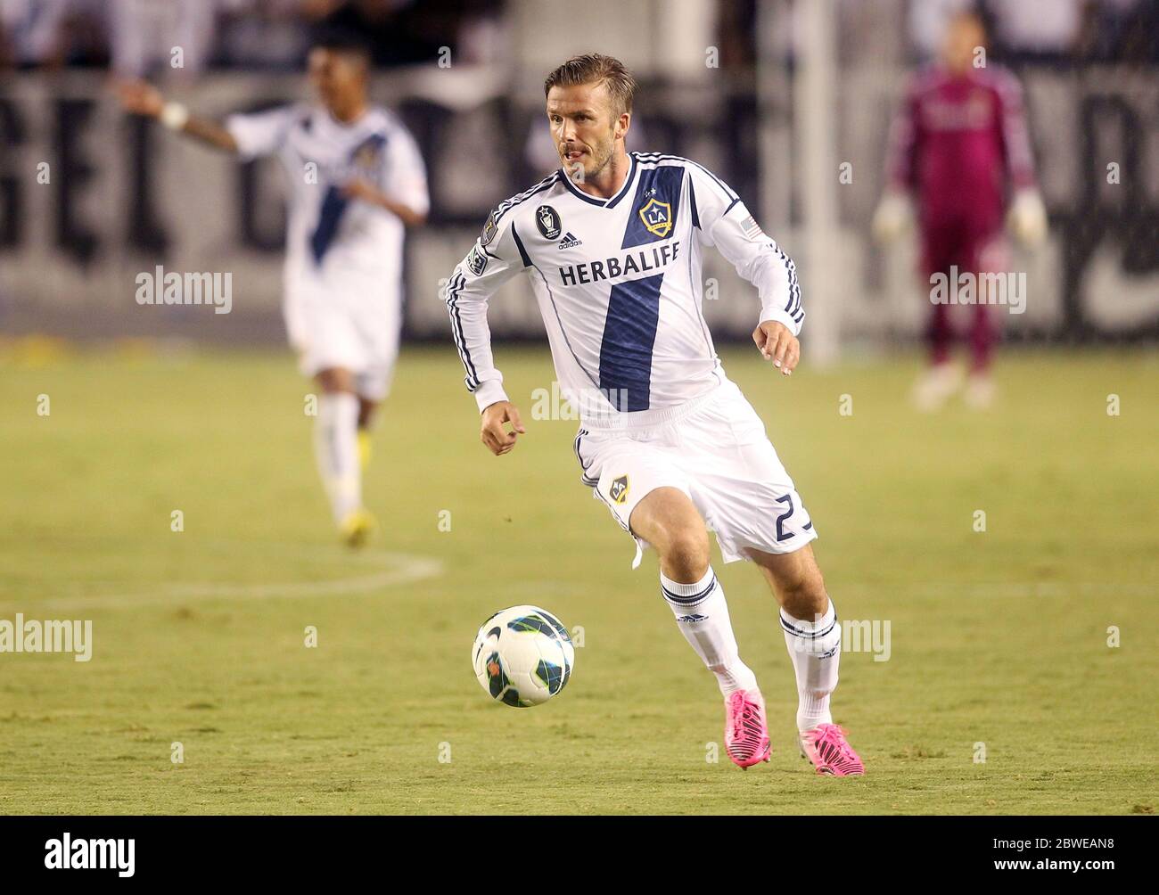 David Beckham kicking football during game, February 2011 Stock Photo ...