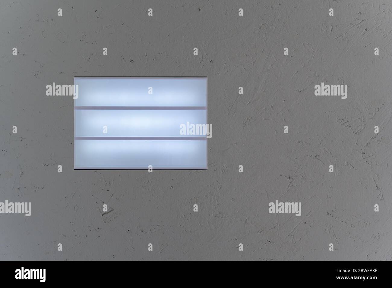 White lightbox without text on a grey background. Place for text or ...