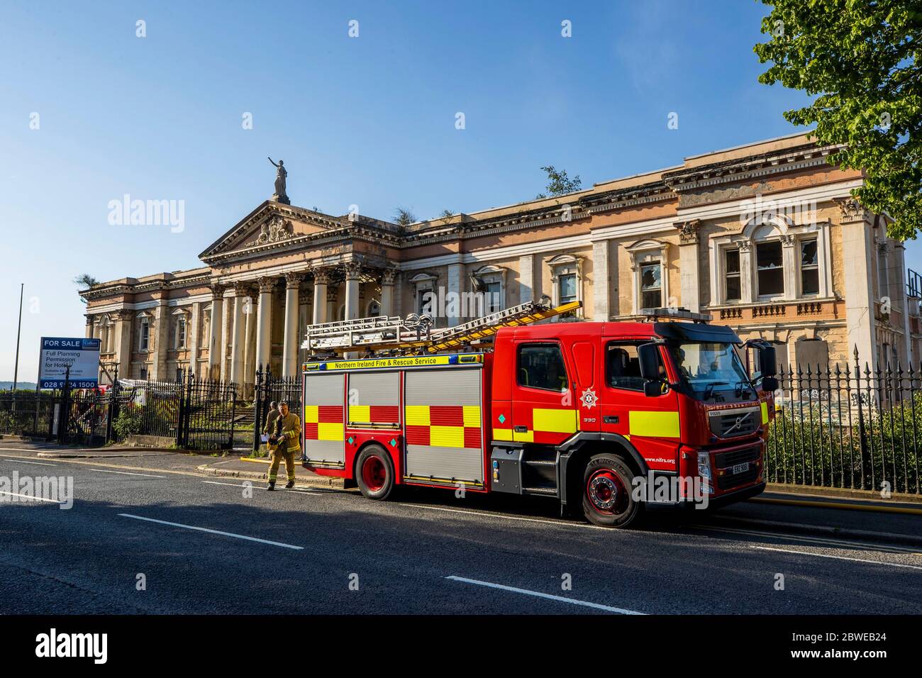 Northern Ireland Fire and Rescue Service firefighters tackling a large ...