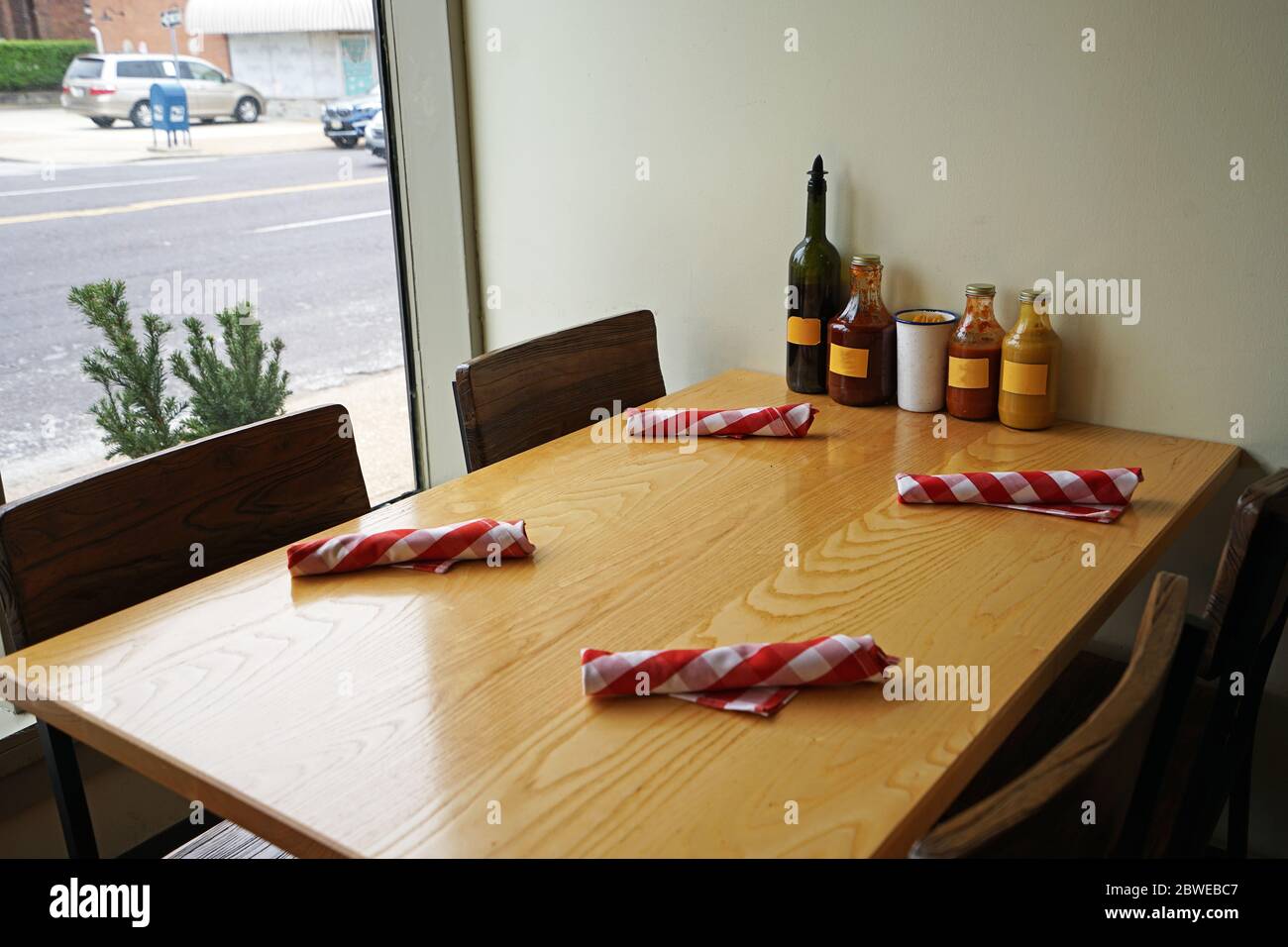 Restaurant table setting and arrangement, decorated with dipping sauce ...