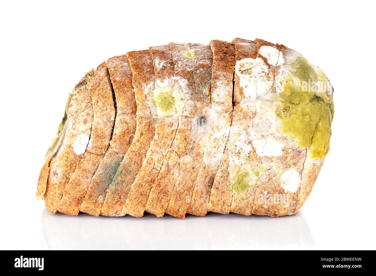 Mildew on a sliced loaf of bread. Old loaf of bread, covered with ...