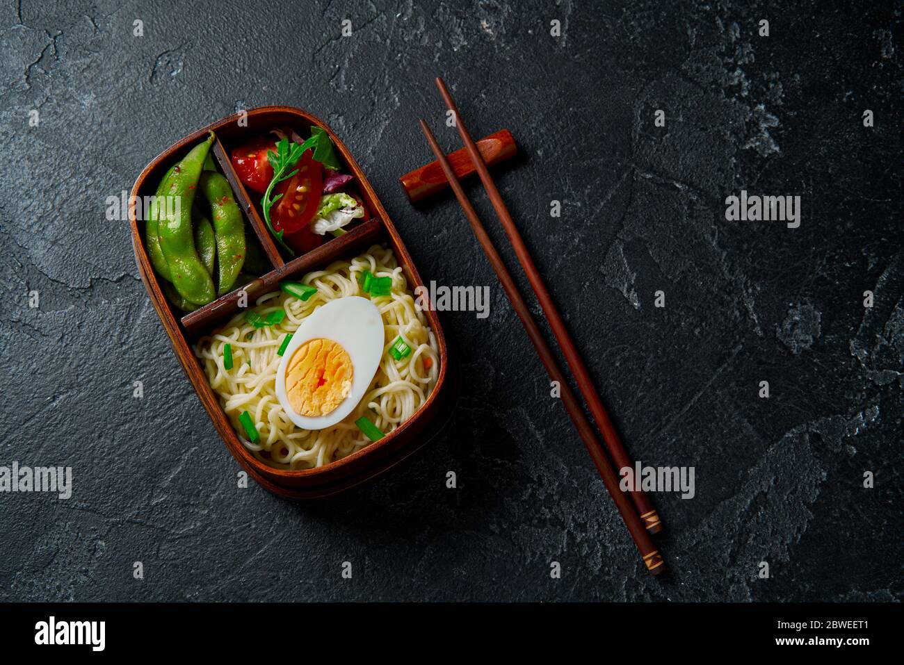 Japanese lunch bento box. Take away concept on stone background Stock ...