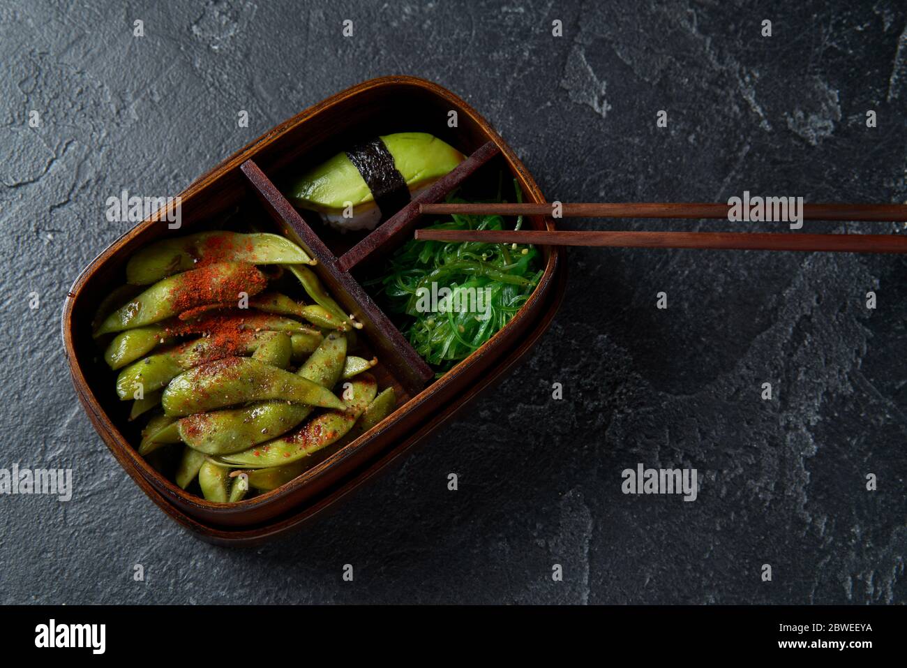 Asian food with freash vedeterian meals in wooden bento box from a ...