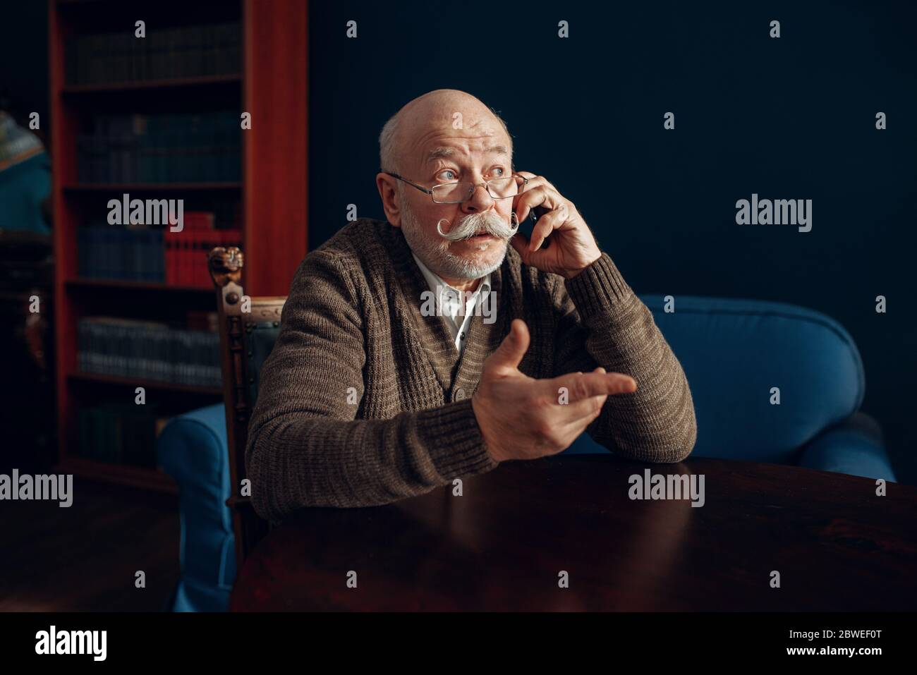 Cheerful senior old businessman talking hi-res stock photography and ...