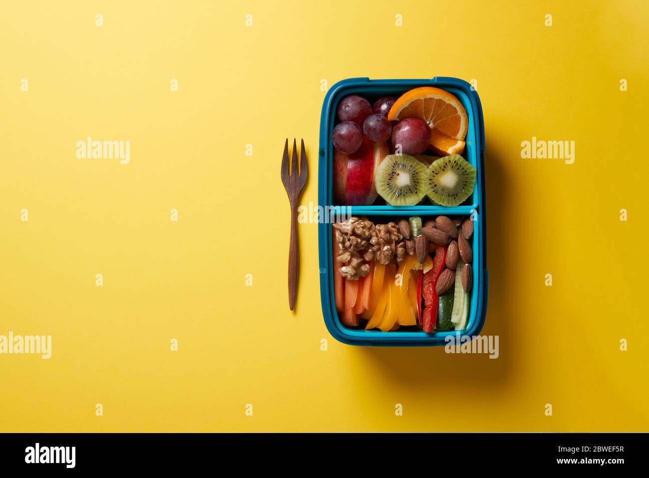 Top View of Full Lunch Box with Fuits, Vegetables and nuts. Healthy ...