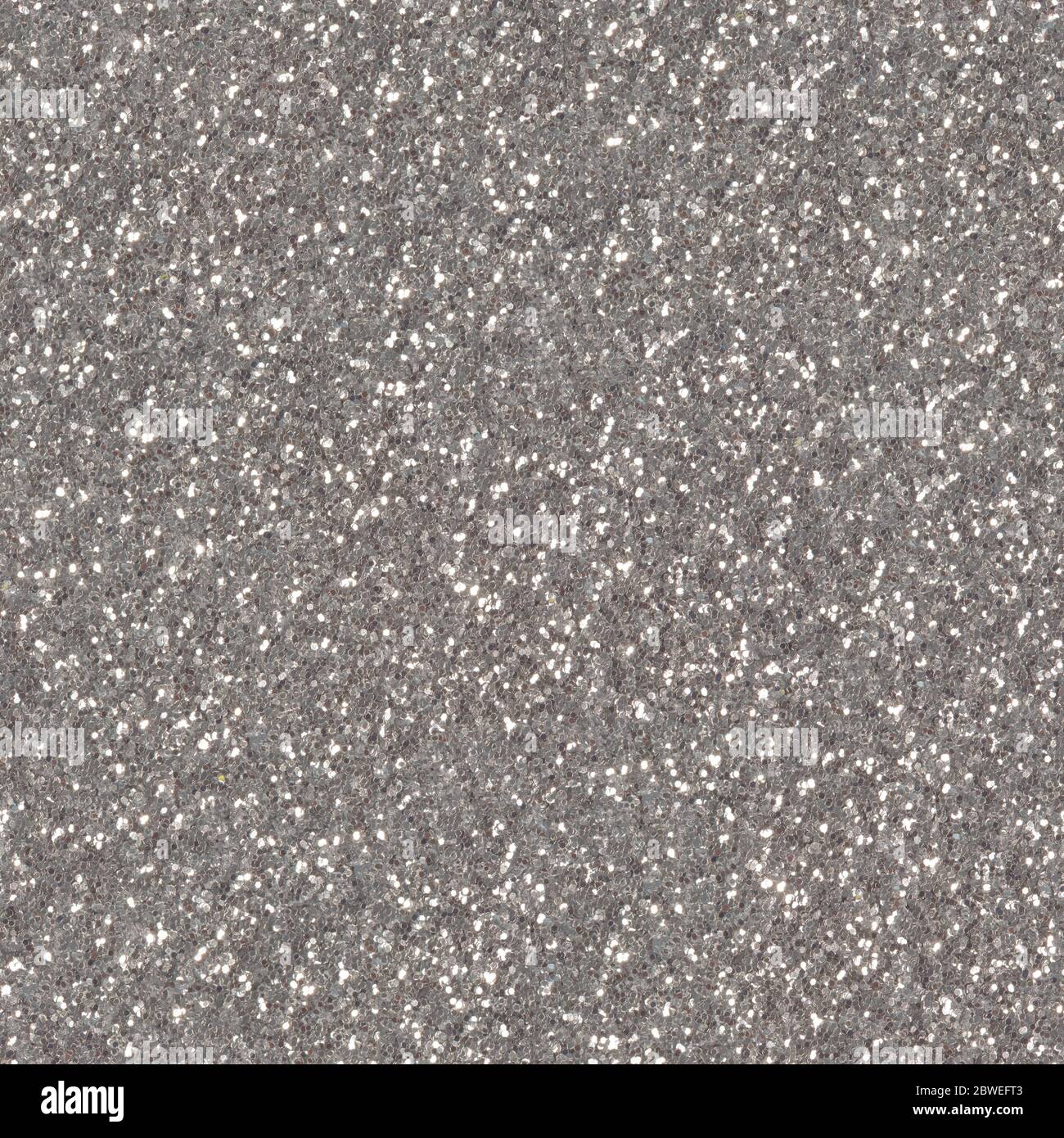 Silver glitter sparkle. Background for your design. Low contrast photo. Seamless texture. Tile ...