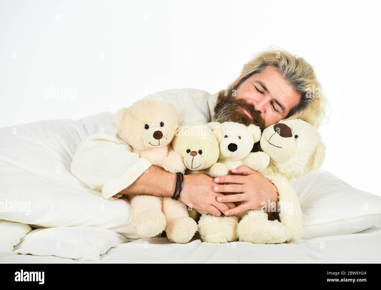Man Sleeping In Bed With Teddy Bear