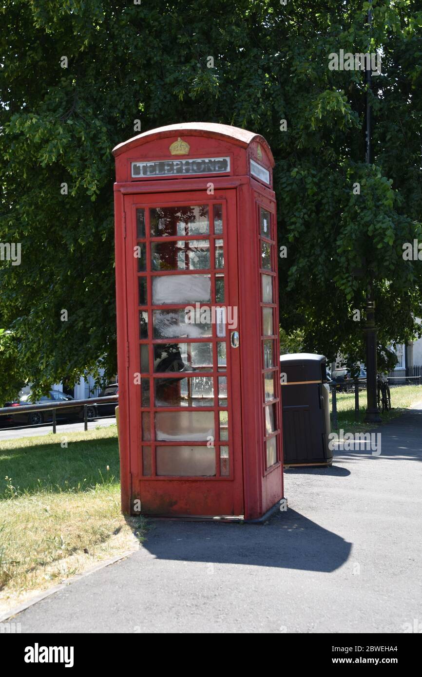 A traditional red British Telecom telephone box in Clifton, Bristol ...