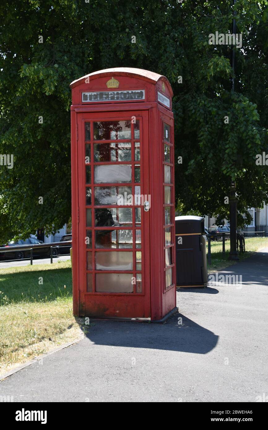 A traditional red British Telecom telephone box in Clifton, Bristol ...