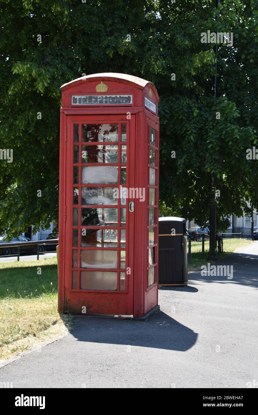 A traditional red British Telecom telephone box in Clifton, Bristol ...