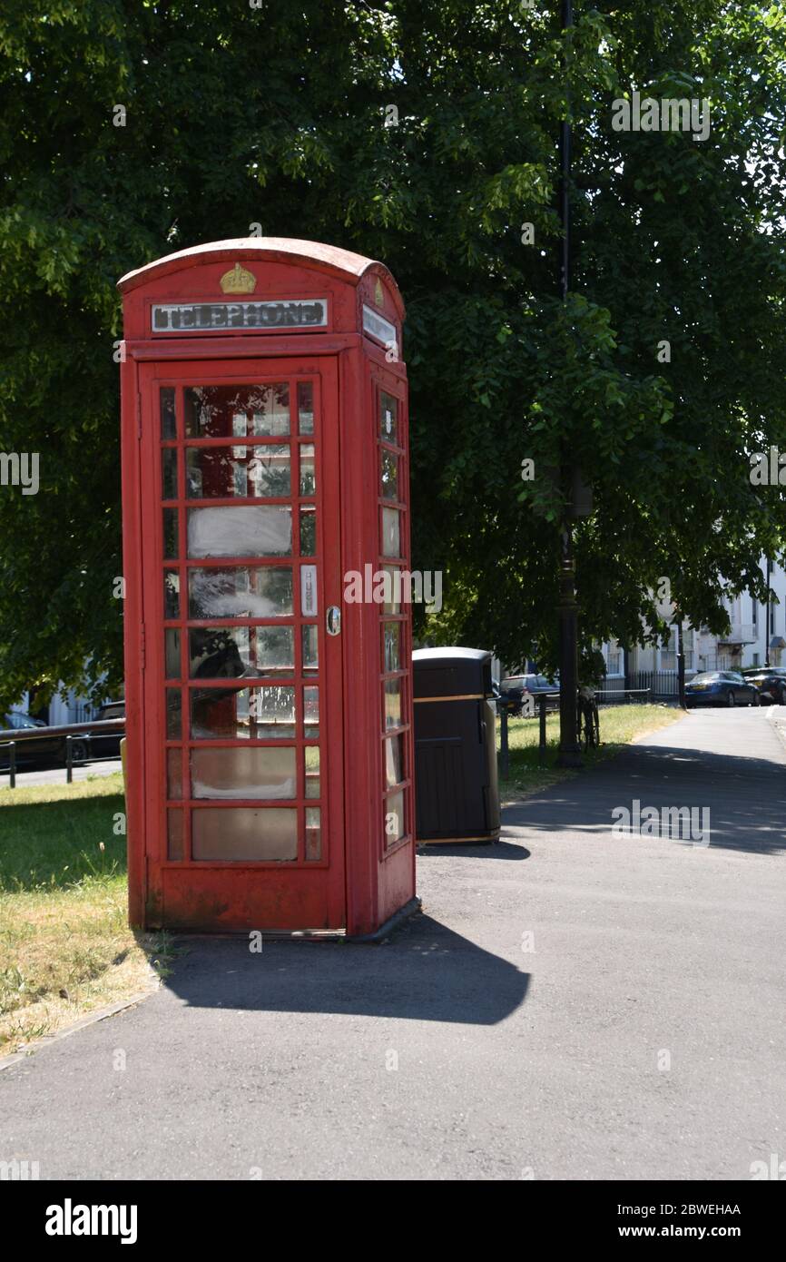 A traditional red British Telecom telephone box in Clifton, Bristol ...