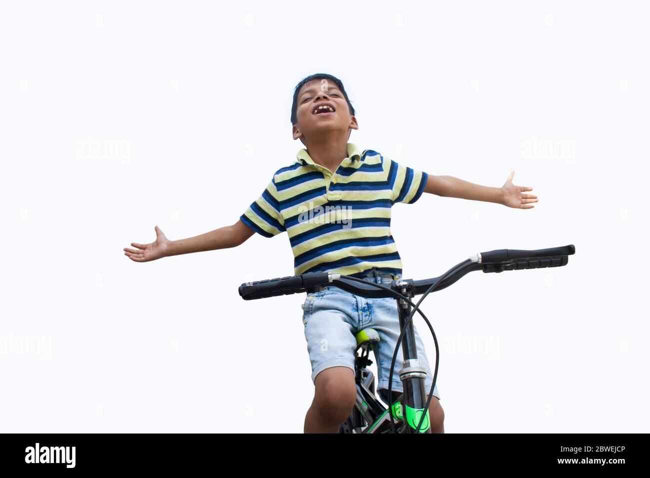 happy boy ride a bicycle Stock Photo - Alamy