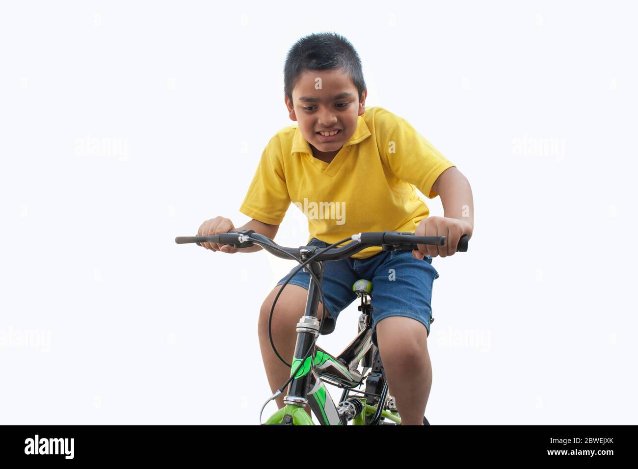 happy boy ride a bicycle Stock Photo - Alamy