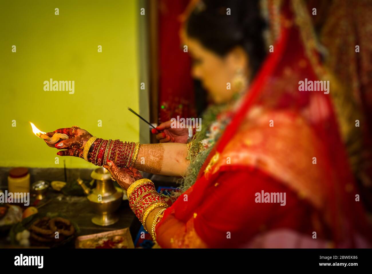 Bride offering prayers to god during wedding ceremony,Nepali Indian ...