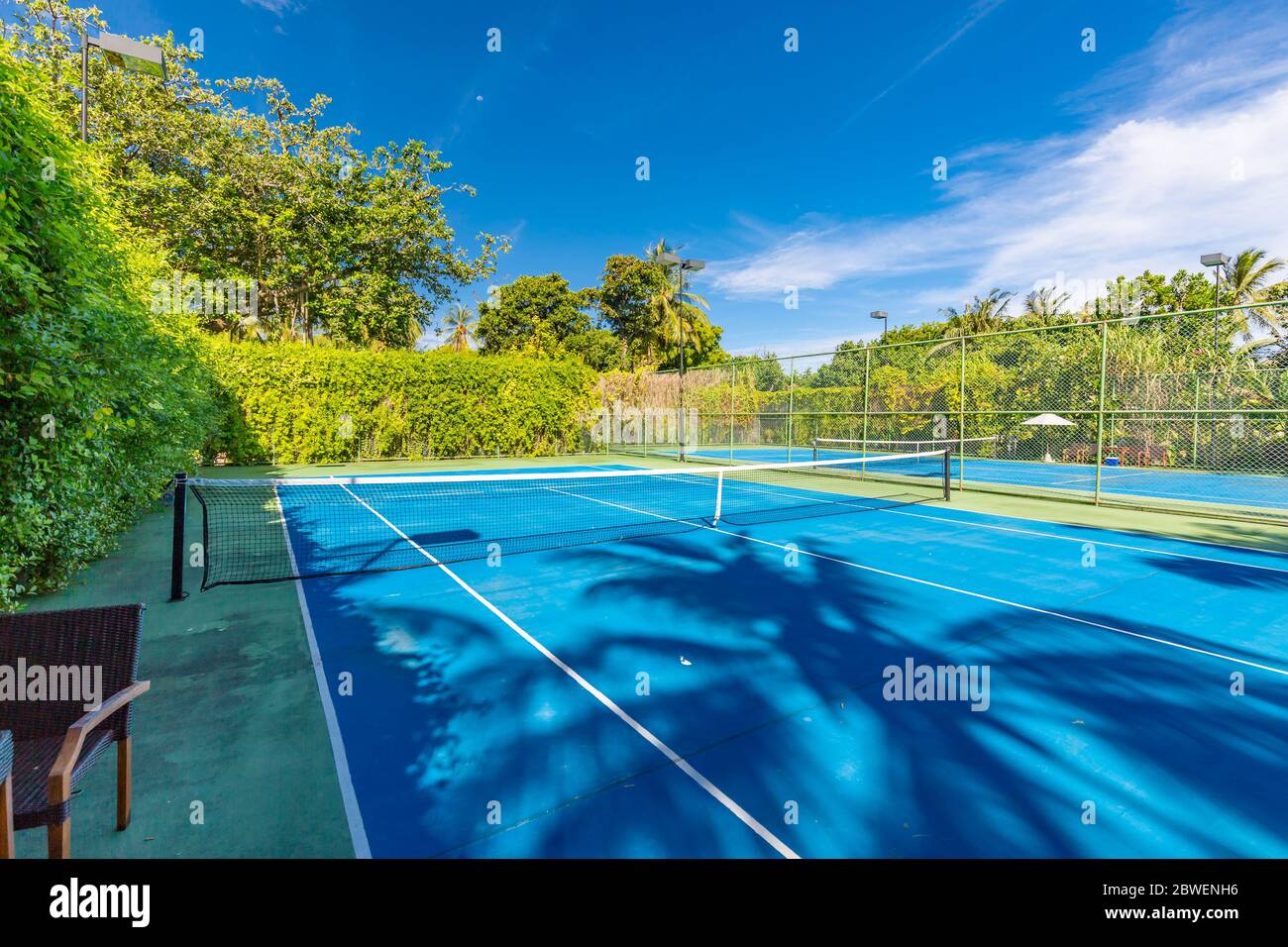 Amazing sport and recreational background as tennis court on tropical ...