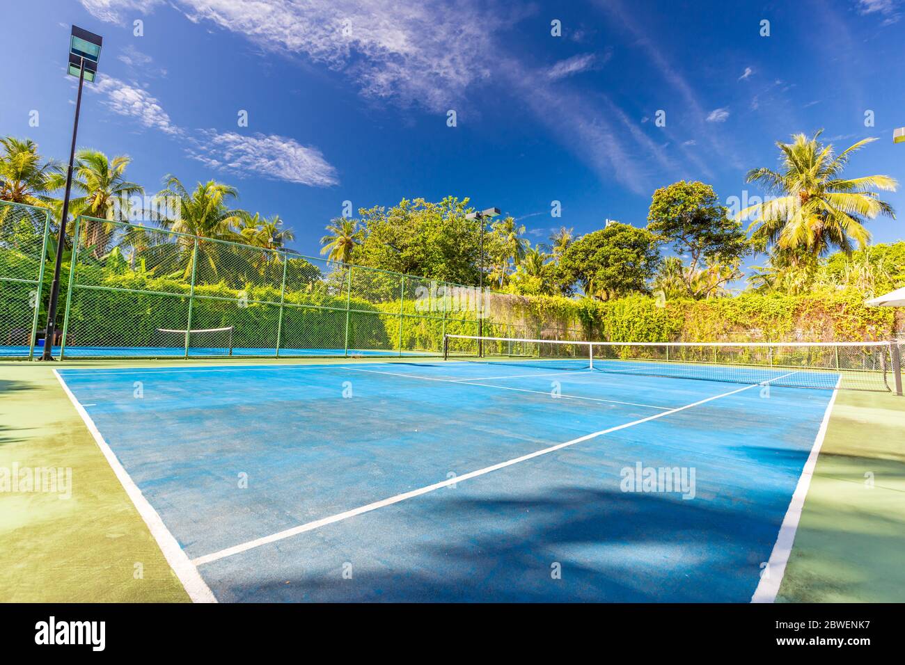 Amazing sport and recreational background as tennis court on tropical ...