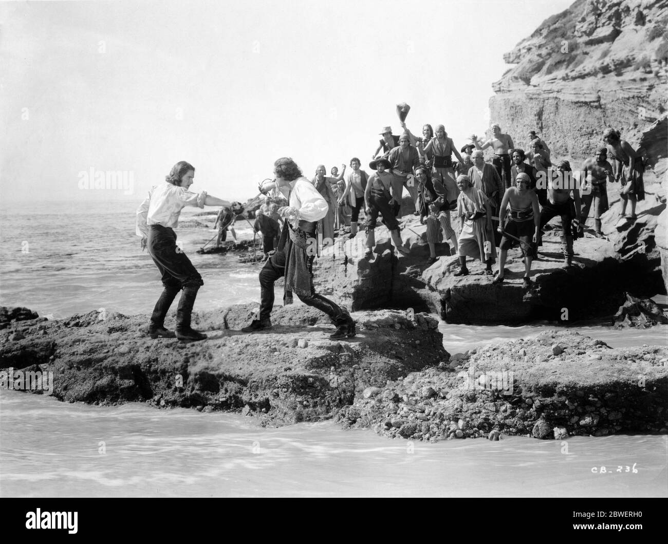 ERROL FLYNN and BASIL RATHBONE duelling in CAPTAIN BLOOD 1935 director ...