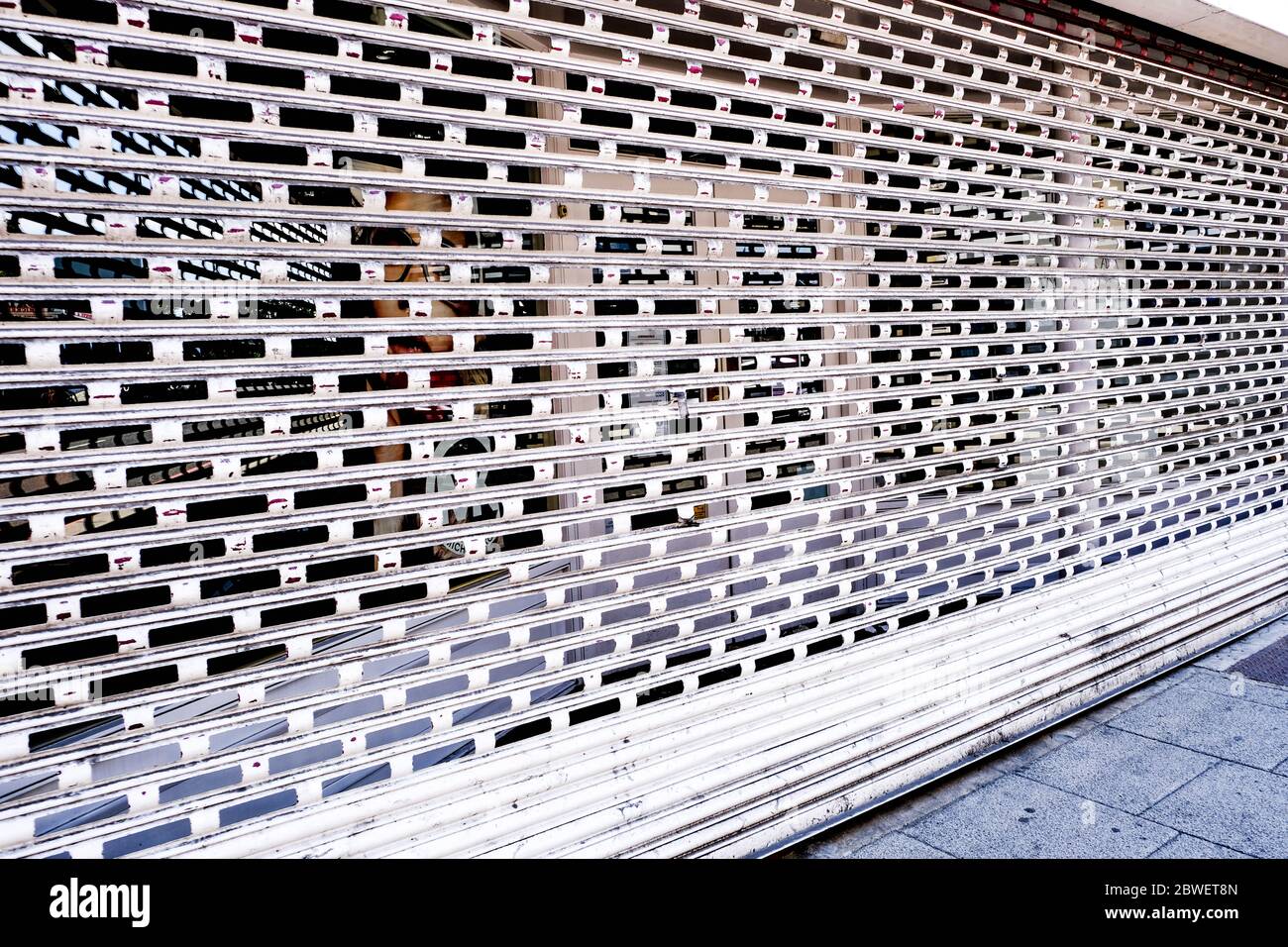 Closed shop shutters hi-res stock photography and images - Alamy