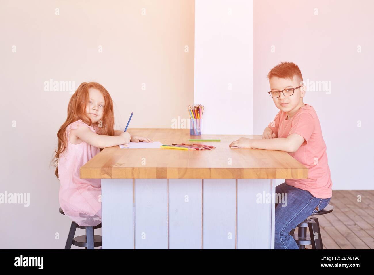 Little boy and girl drawing. Closed Locking Exercise. Homemade routine ...