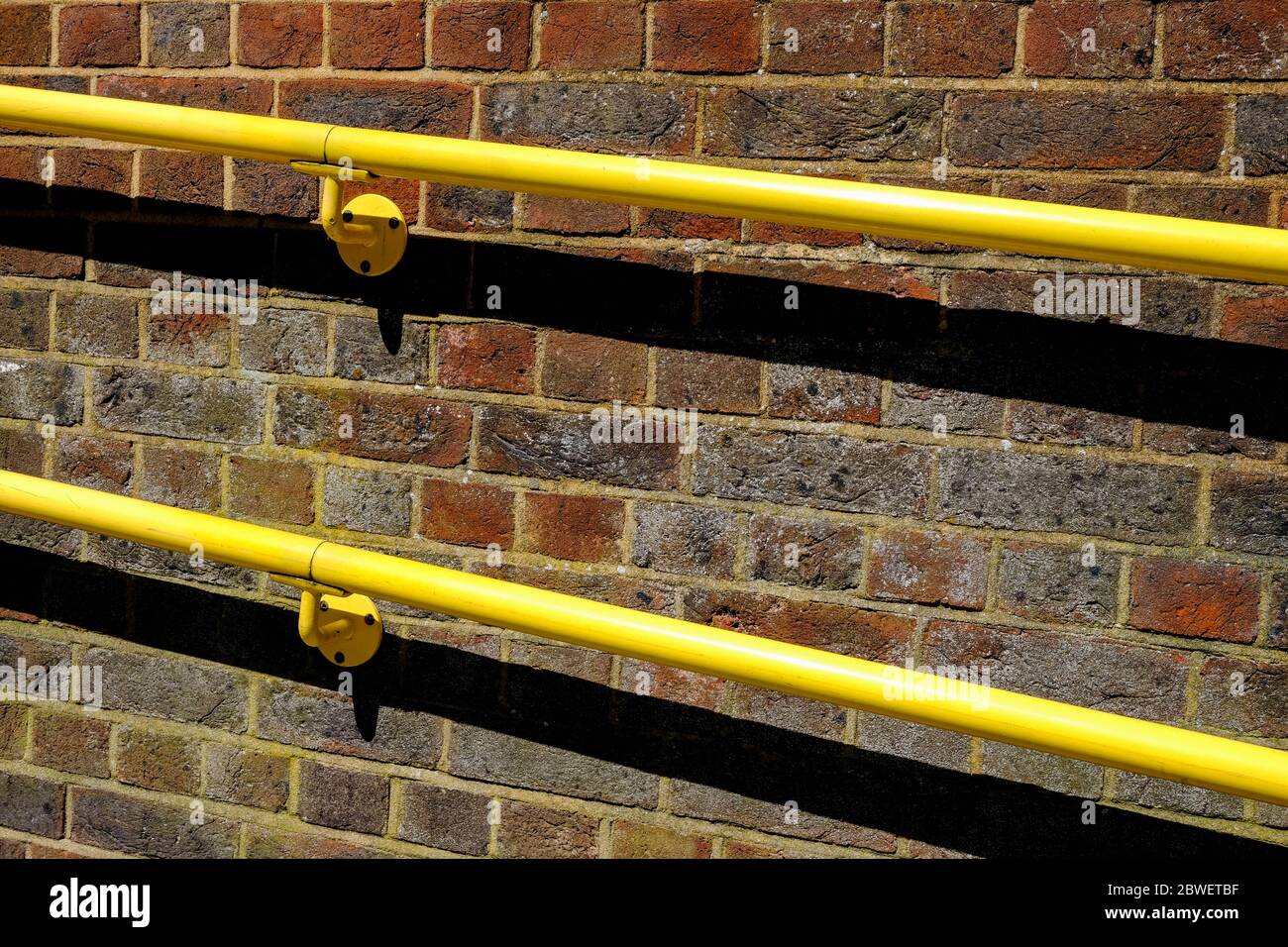 Bright yellow handrails hi-res stock photography and images - Alamy