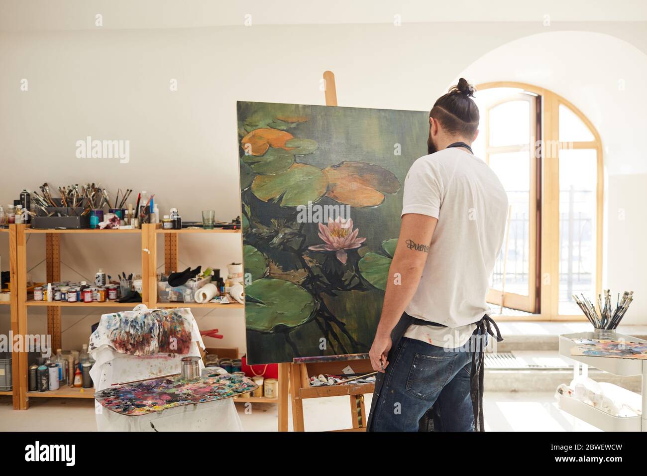 Back view man painter working hi-res stock photography and images - Alamy
