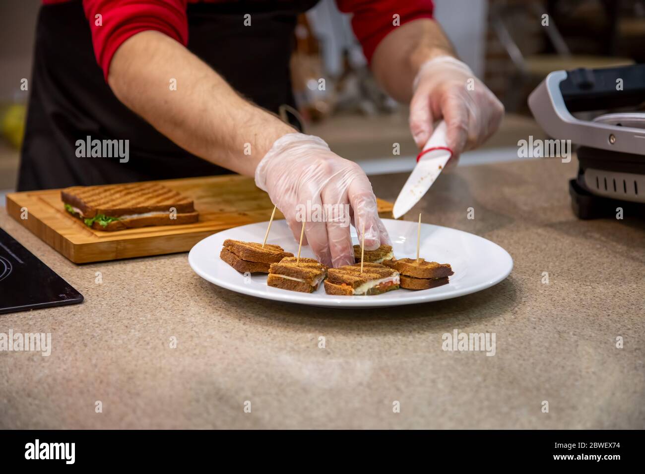 Male hands preparing sandwiches hi-res stock photography and images - Alamy