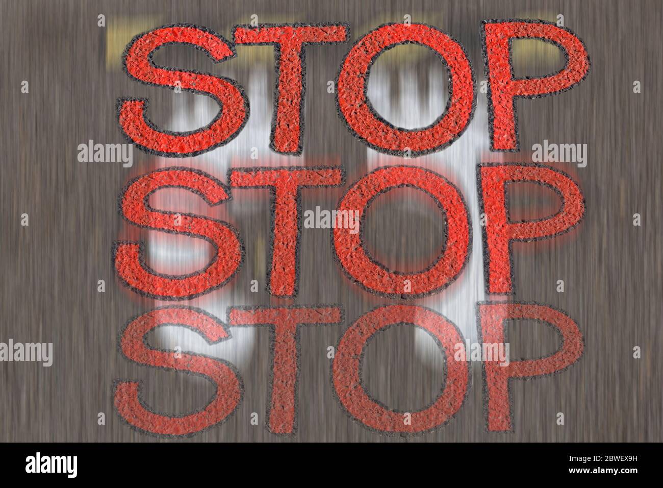 Stop sign with blurred footprints on pavement at Poole, Dorset UK in ...
