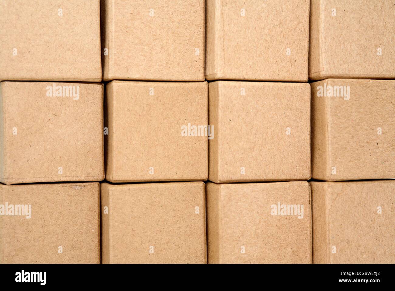 Stack of cardboard cubes closeup as background Stock Photo - Alamy