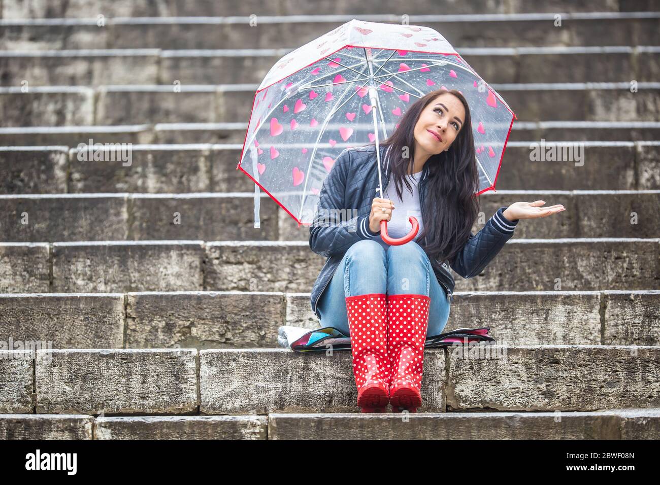 Checking if rain stopped hi-res stock photography and images - Alamy