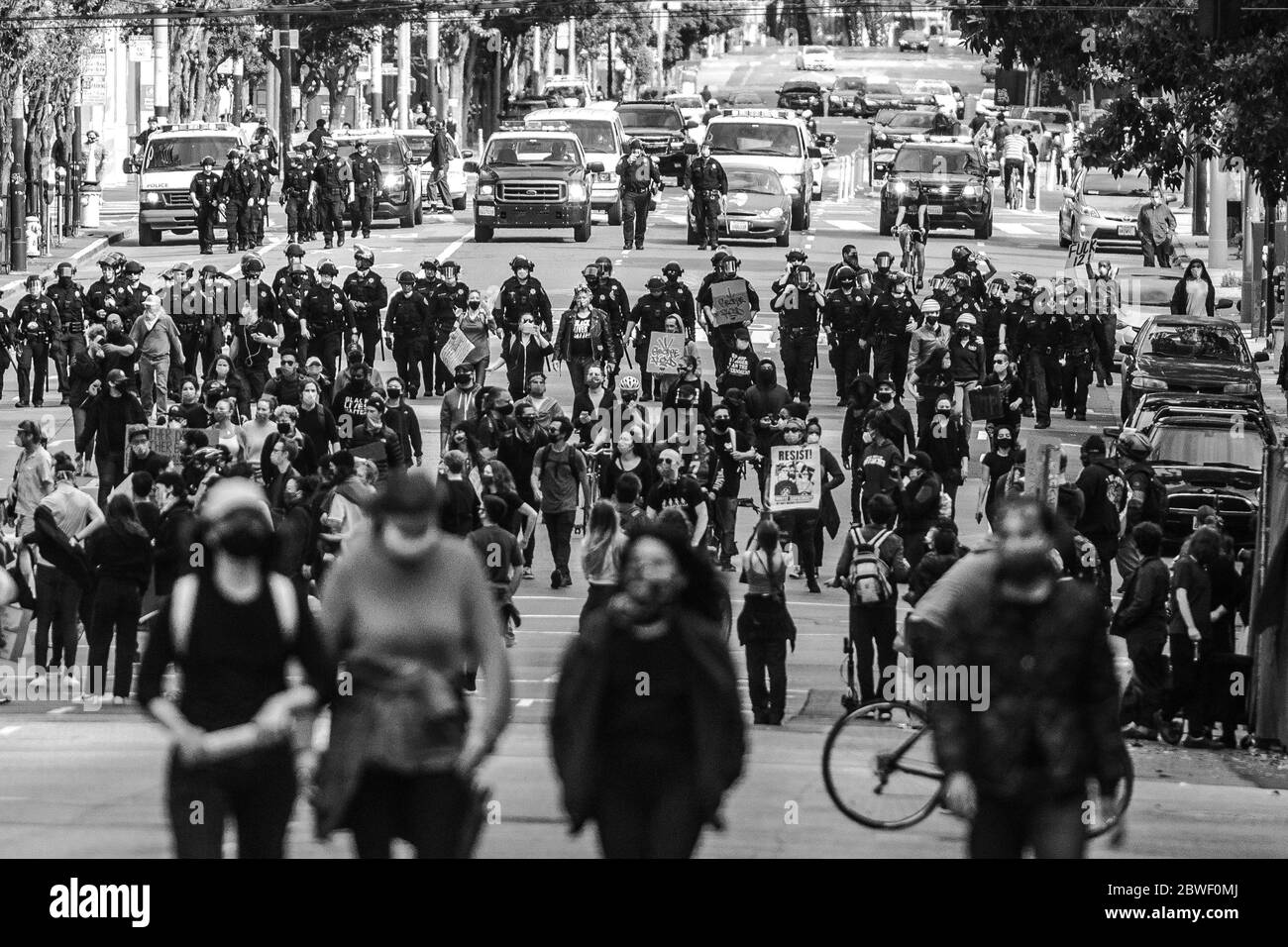 SAN FRANCISCO, CA- MAY 31: Protestors walk away from a line of police ...