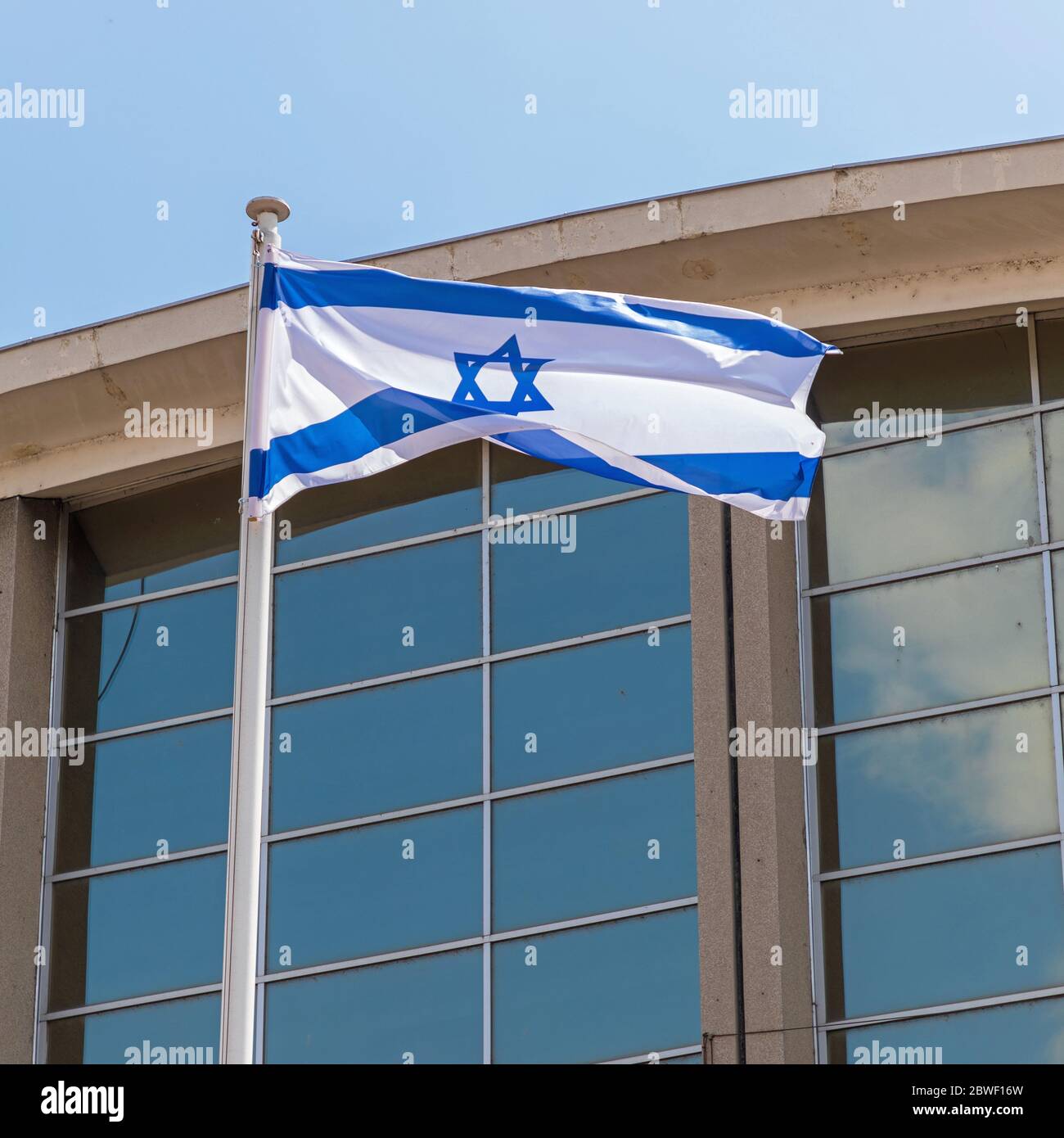 National Flag of Israel in Front of Building Stock Photo - Alamy