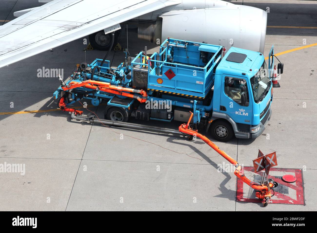 KLM hydrant truck aircraft refueler refuelling Boeing 737 at Amsterdam ...