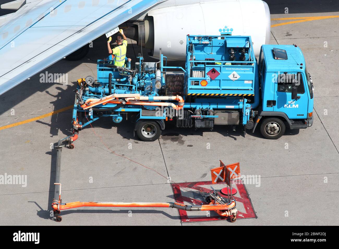 KLM hydrant truck aircraft refueler refuelling Boeing 737 at Amsterdam ...