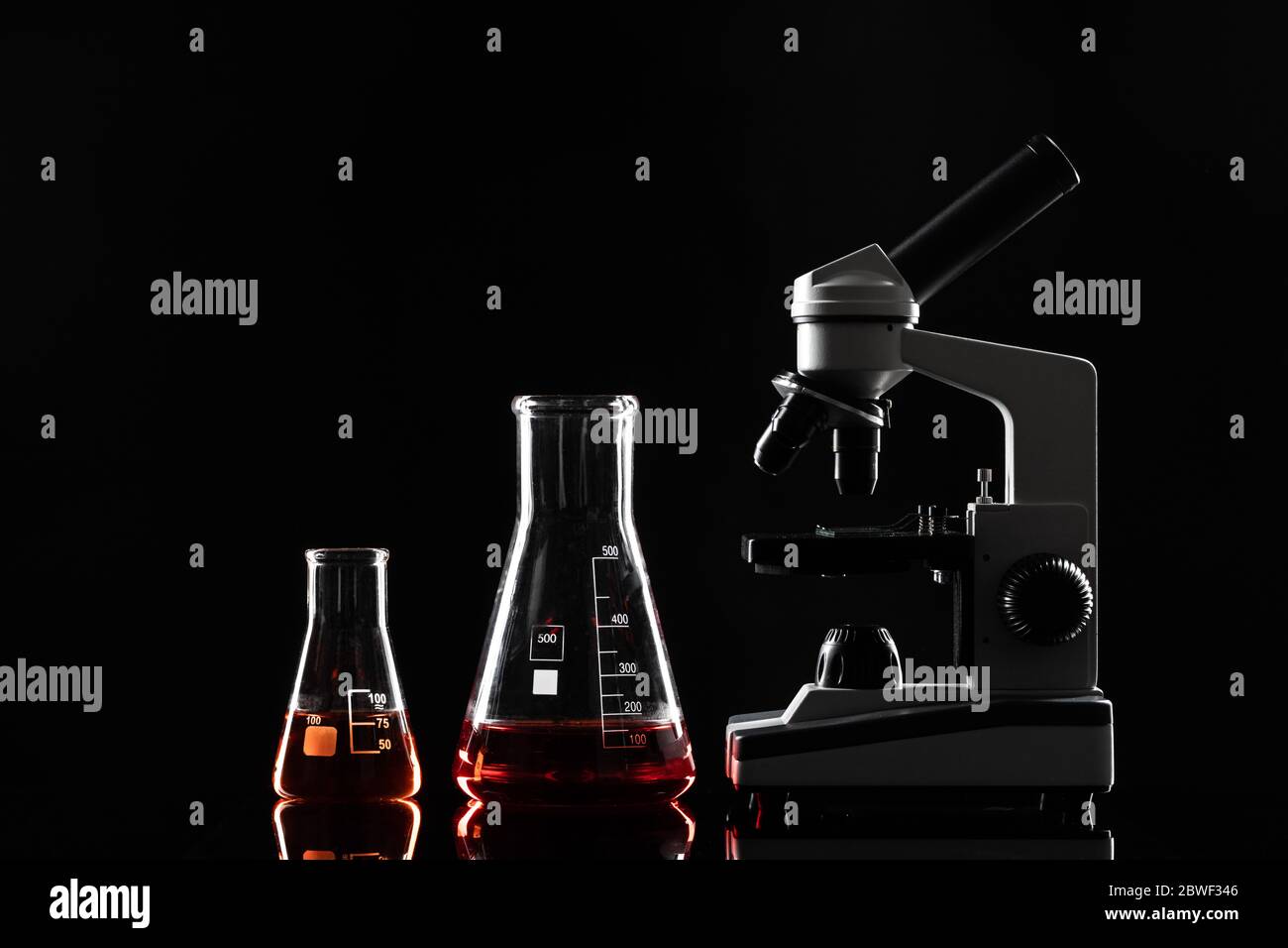 laboratory microscope on table in the dark Stock Photo - Alamy