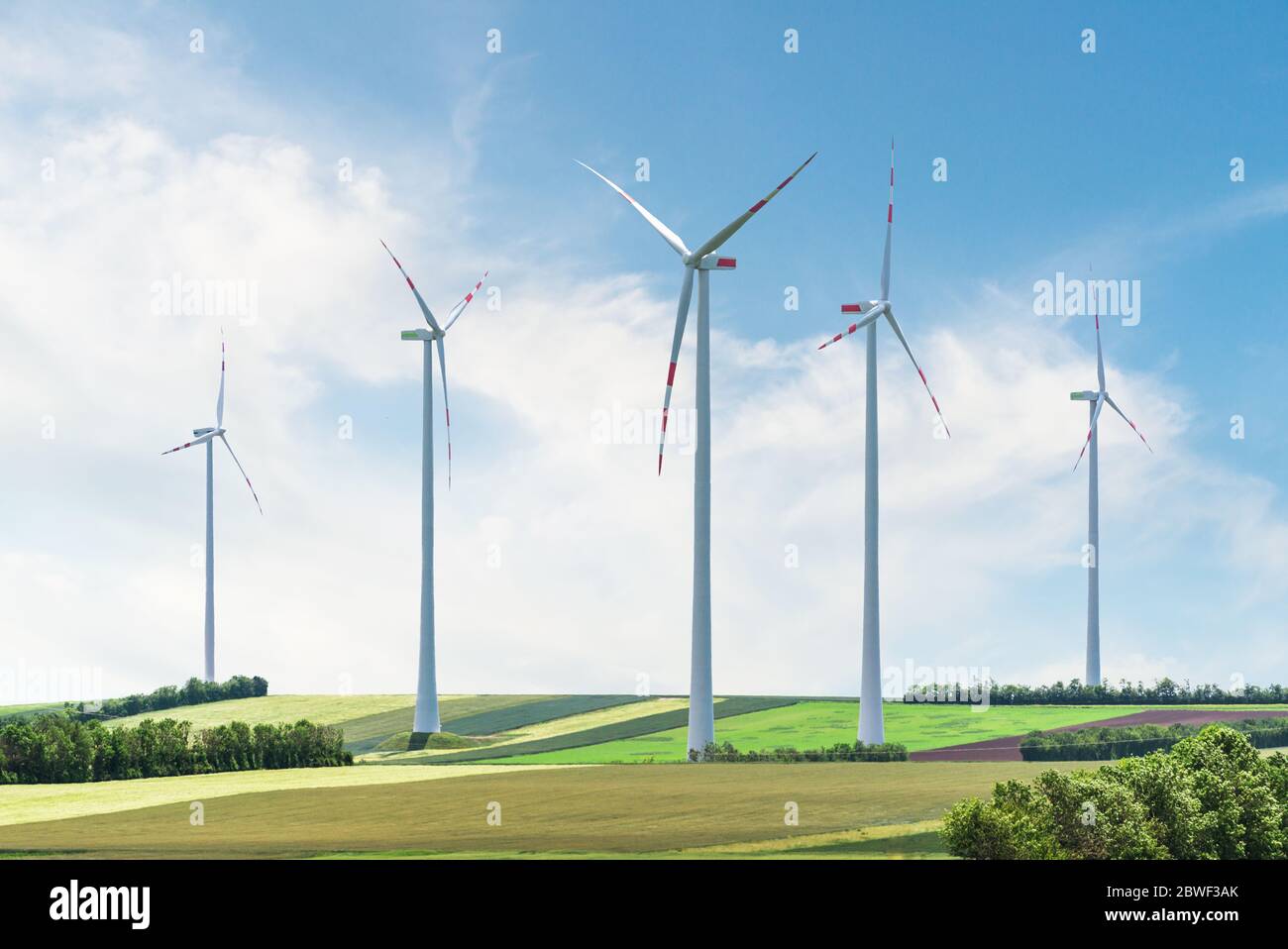 Wind turbines farm, alternative energy Stock Photo - Alamy