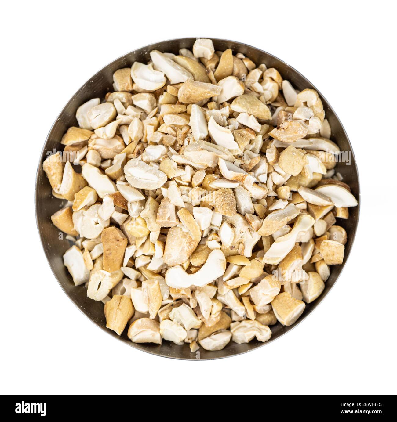 Chopped Cashew nuts isolated on white background as detailed close-up ...