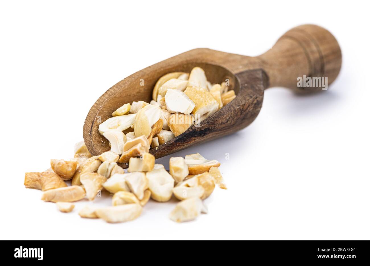 Chopped Cashew nuts isolated on white background as detailed close-up ...