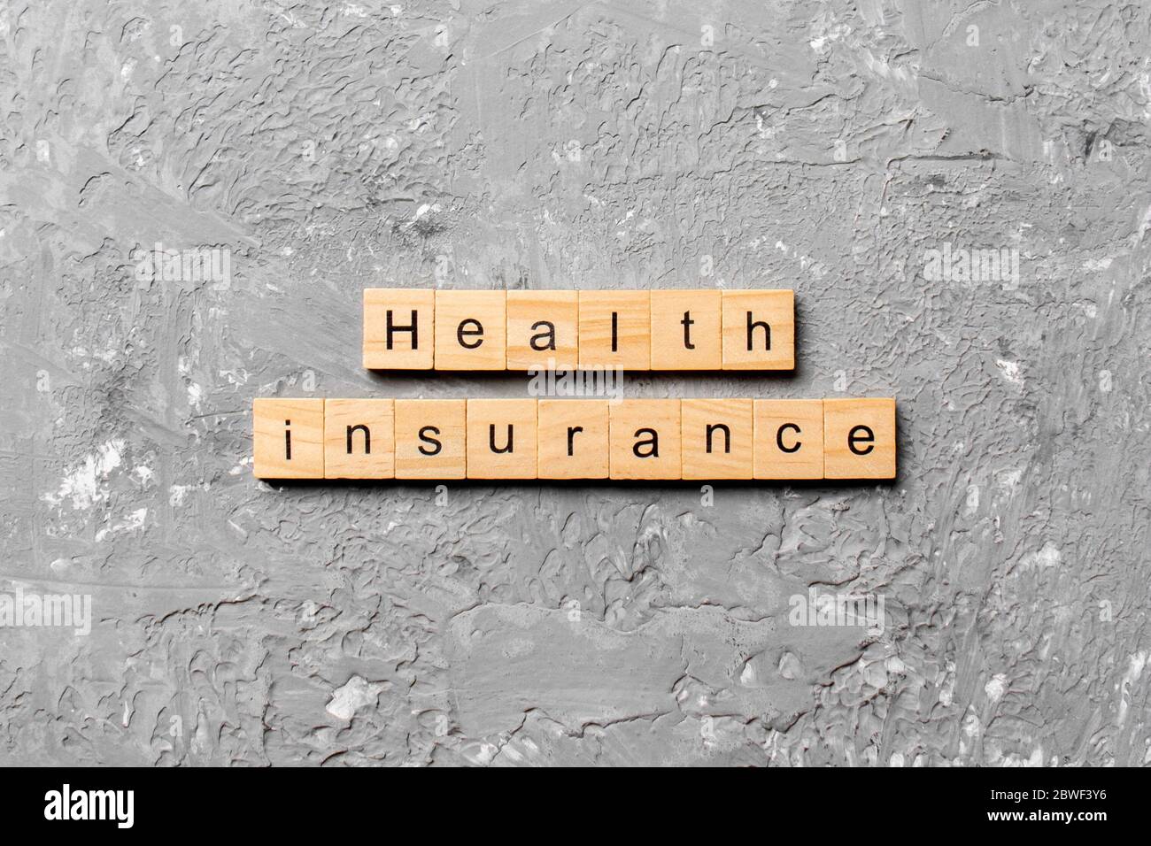 Health insurance word written on wood block. Health insurance text on ...