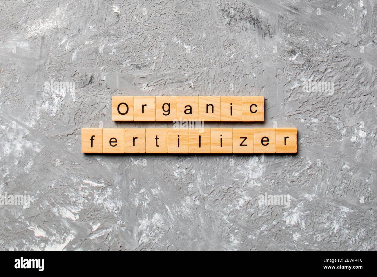 organic fertilizer word written on wood block. organic fertilizer text ...