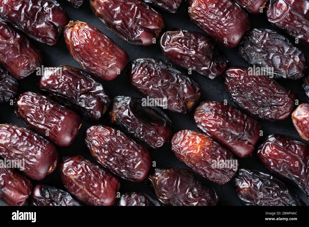 Dried dates background texture top view. Tasty dried dates. Islamic ...