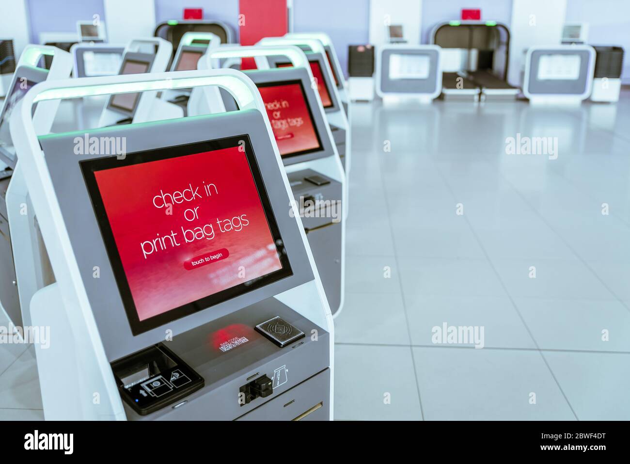 Self service electronic boarding pass readers at international airport ...