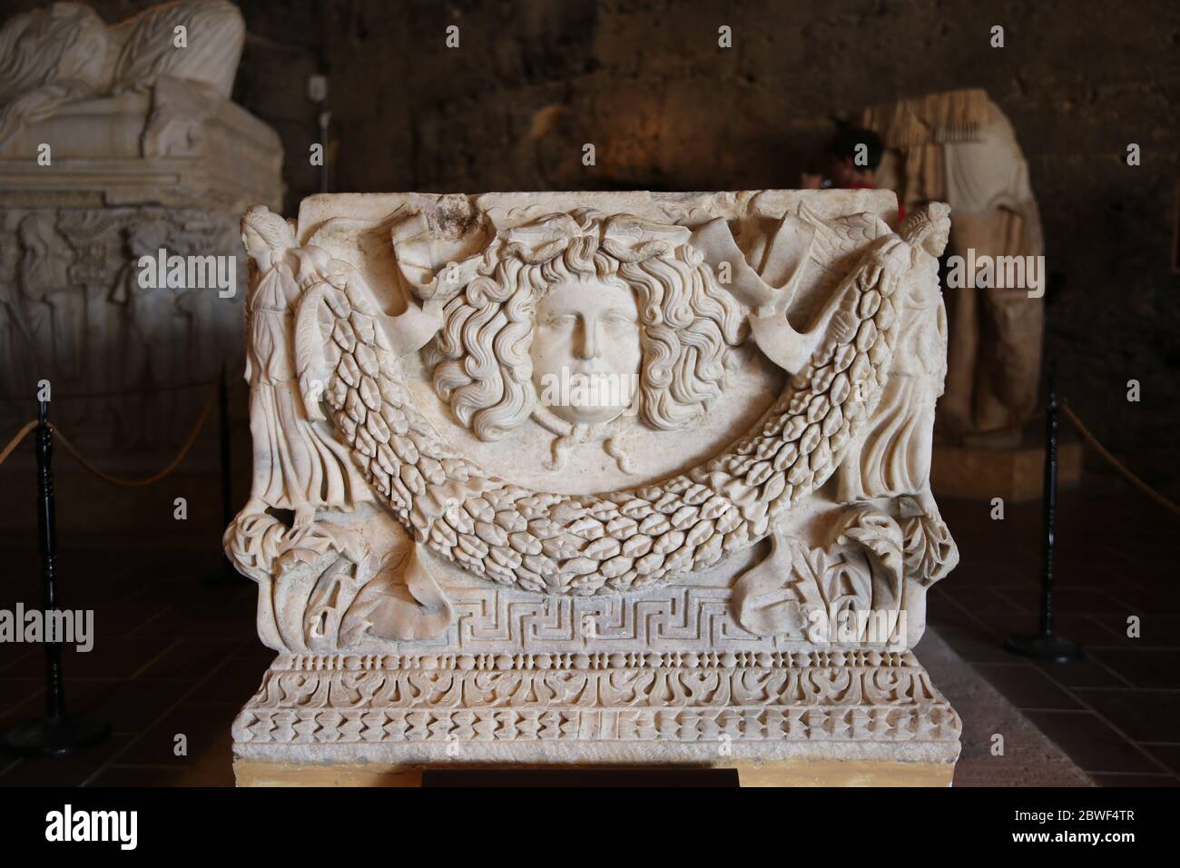 Roman sarcophagus with garland. Detail of head of Medusa. 2nd century ...