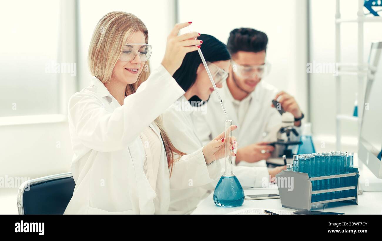 group of scientists conduct research in the laboratory Stock Photo - Alamy
