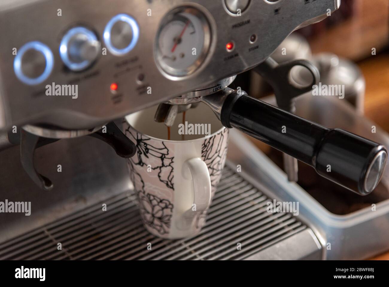 Automatic coffee machine preparing espresso Stock Photo - Alamy
