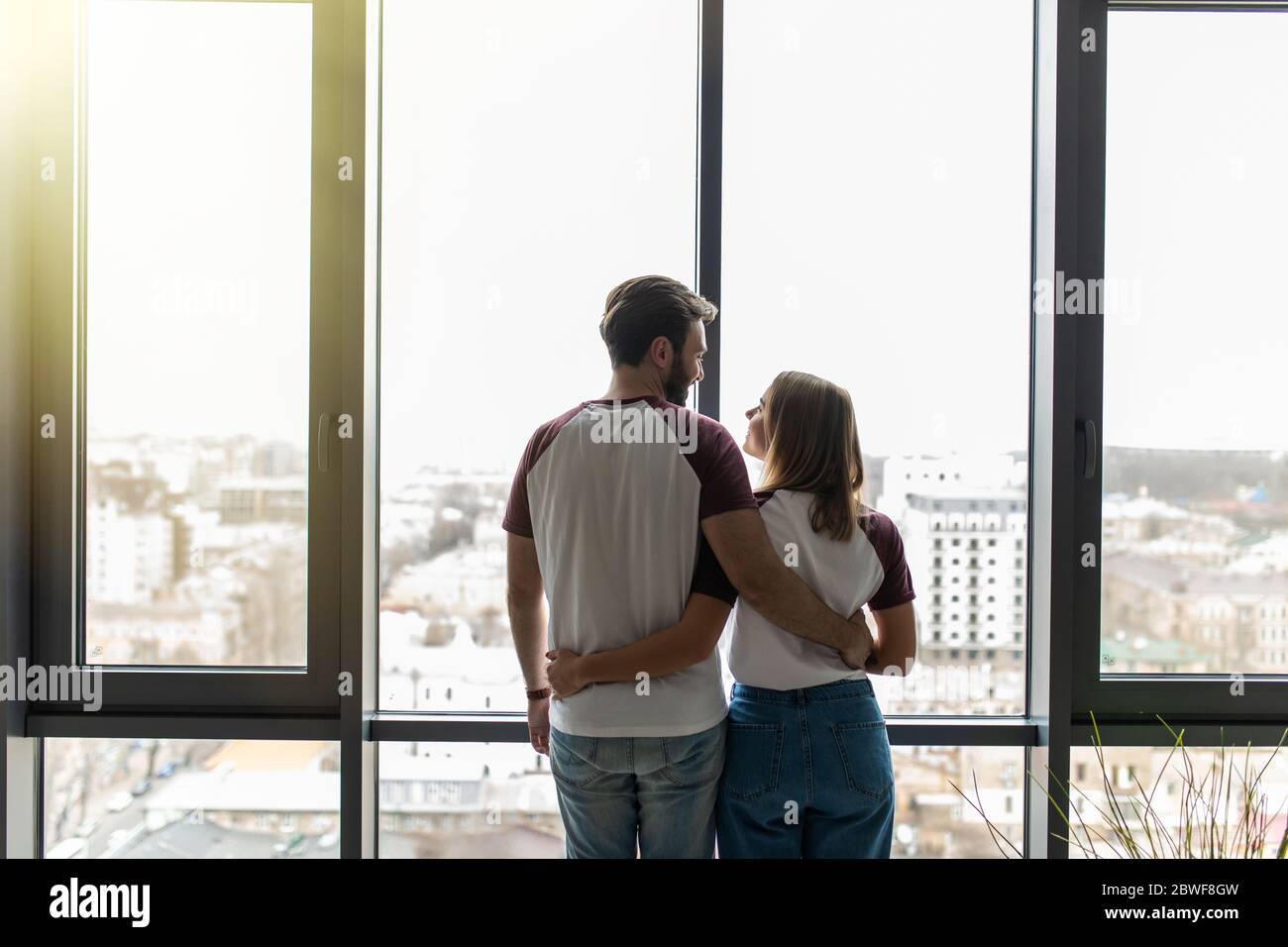 Young Beautiful Couple Stand Near Window Embrace, Happy Smile Hispanic ...