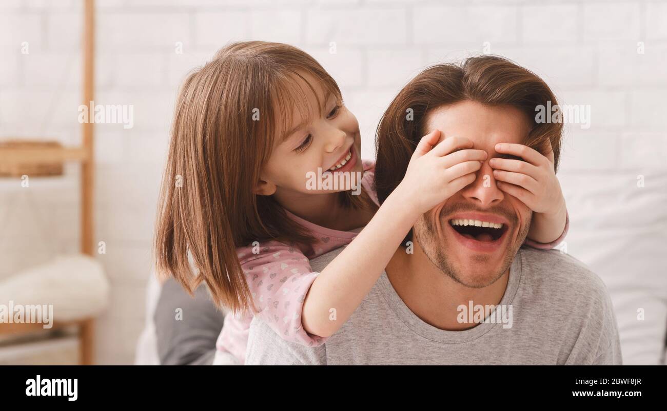 Girl covering eyes father eyes hi-res stock photography and images - Alamy