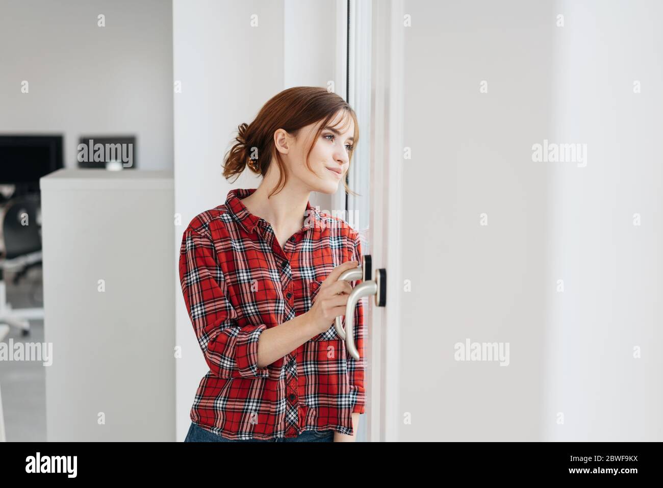 Female waiting outside door hi-res stock photography and images - Alamy